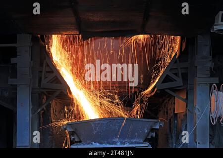 steelmaking converter dumping steel slag in a factory, closeup of photo ...