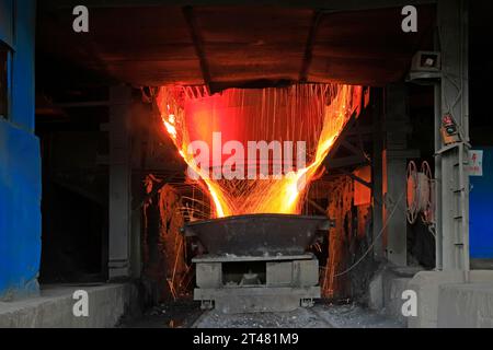 steelmaking converter dumping steel slag in a factory, closeup of photo ...