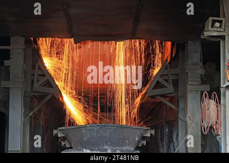 steelmaking converter dumping steel slag in a factory, closeup of photo ...