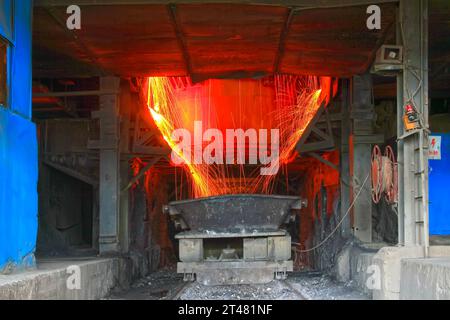 steelmaking converter dumping steel slag in a factory, closeup of photo ...