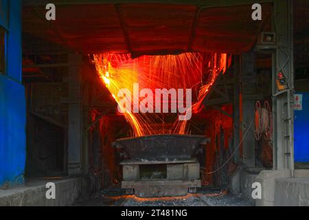 steelmaking converter dumping steel slag in a factory, closeup of photo ...