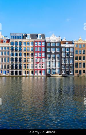 Iconic view of traditional old buildings in Amsterdam, the Netherlands ...