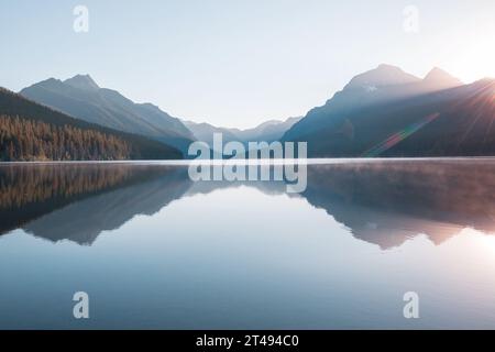 Beautiful Bowman lake with reflection of the spectacular mountains in ...
