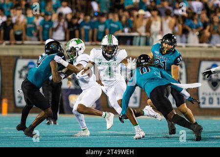 Marshall wide receiver DeMarcus Harris (4) is defended by Georgia ...