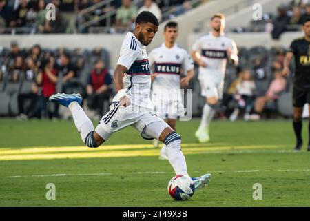 Vancouver Whitecaps midfielder Pedro Vite (45) is fouled by Real Salt Lake defender Alexandros ...