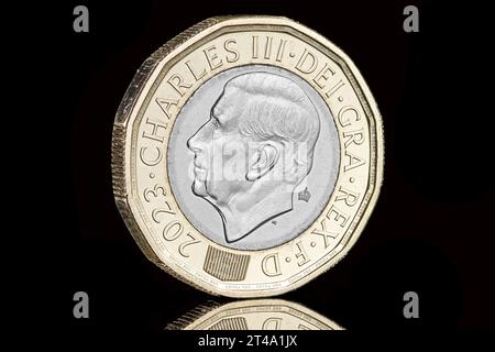 The 2023 12 sided bimetallic one pound coin featuring the new design of ...