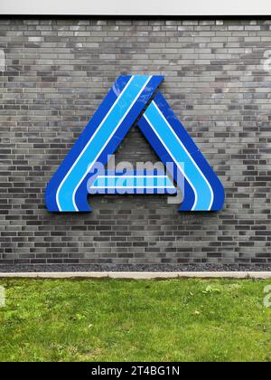 Logo A in blue without lettering on wall of supermarket of retail chain ...