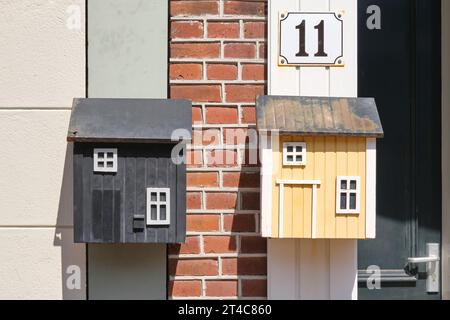 Mailbox in the shape of a small house Stock Photo - Alamy