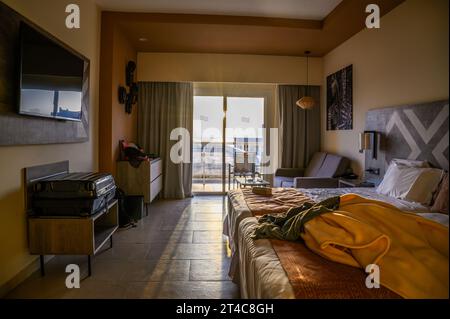 Luxury five star hotel bedroom water or whisky drinking glasses on ...