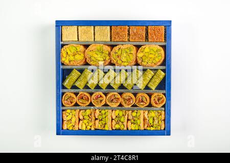 Arabic sweets boxes. Pictured from above showing several shapes and ...