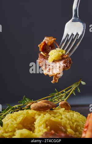 Rice cooked Iraqi style with lamb and nuts Stock Photo - Alamy