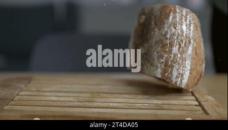 Rustic Tumble Fall of Bread Amidst Flour and Crumbs Stock Photo - Alamy