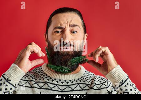 Christmas holidays and celebration concept. Confused bearded guy ...