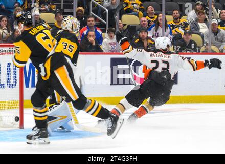 Anaheim Ducks center Mason McTavish (23) handles the puck against Vegas ...