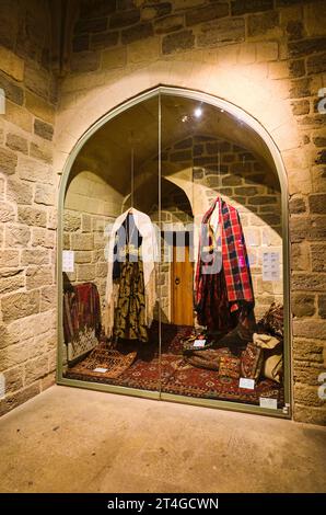 An exhibit of old, fancy, textile, wardrobe, clothes in the palace ...