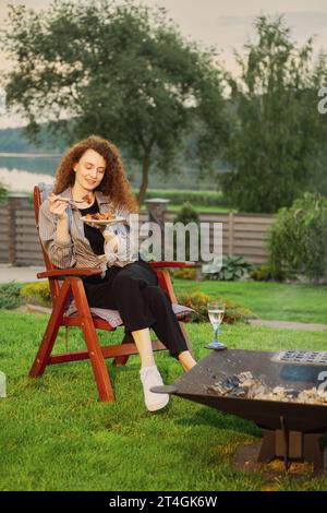 Fire in cozy fireplace, in a country house, winter or autumn holidays ...