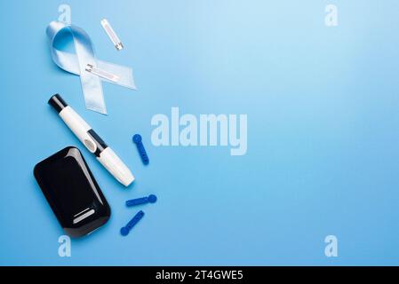 World Diabetes Day, testing and awareness concept. Human hand with ...