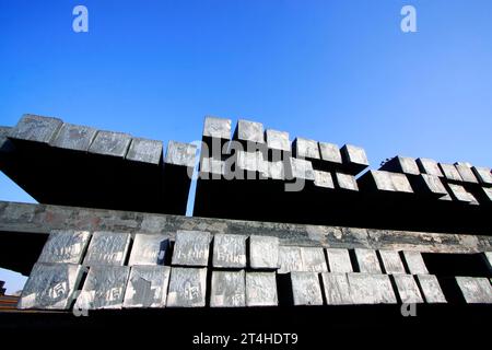 Steel ingot under the blue sky, closeup of photo Stock Photo - Alamy