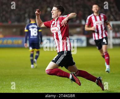 Exeter City's Ryan Trevitt (centre) celebrates scoring their side's ...