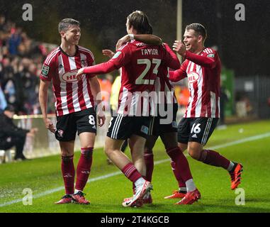 Exeter City's Ryan Trevitt celebrates scoring their side's first goal ...
