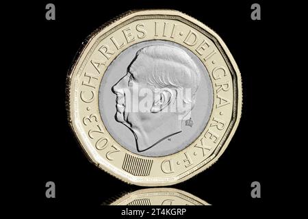 The first UK £1 coin to feature King Charles III. The reverse side ...