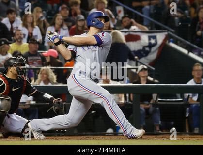 Corey Seager of the Texas Rangers hits a two-run home run off Arizona ...