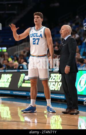 UCLA Bruins guard Jan Vide (27) scores during a NCAA men’s basketball ...