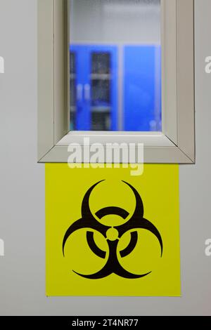 Yellow Door and Biohazard Symbol Stock Photo - Alamy