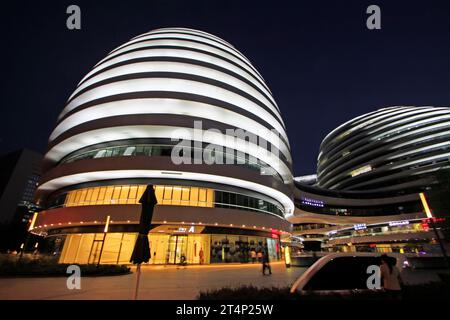 Beijing - September 19: Galaxy SOHO building scene at night, on ...