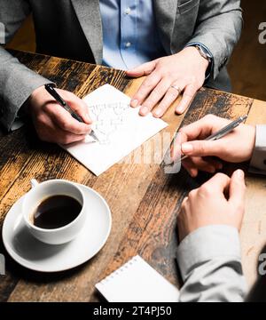 closeup. business team discussing a new marketing scheme.business ...