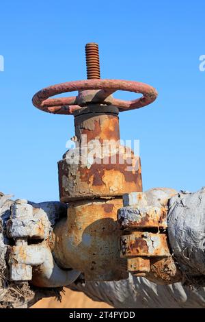 Control the handwheel and pipeline in oilfield Stock Photo - Alamy