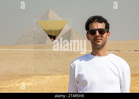 French artist Stephane Breuer poses next to his artwork ’Temple I’, part of 3rd edition of ...