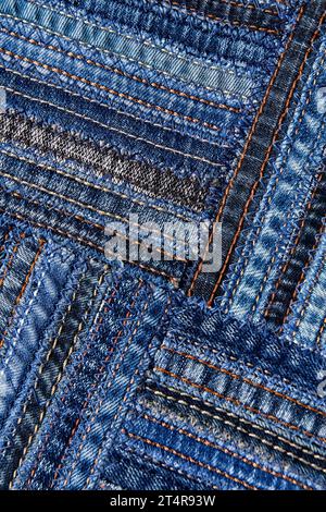 Diagonal denim fabric pattern in patchwork style, made of seams of old ...
