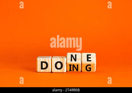 Doing and done symbol. Concept words Doing Done on wooden block ...