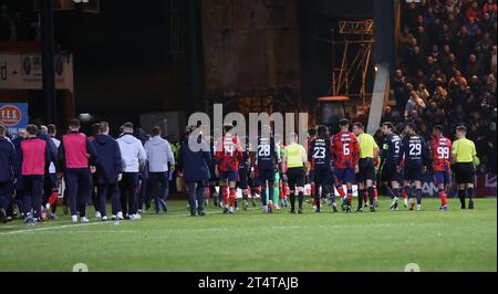 Referee Kevin Clancy takes off players at the start of the match during ...