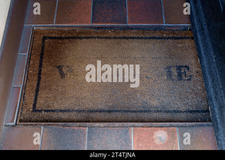 old heavily used bristle doormat in pub entrance concept worn out your ...