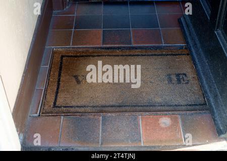 old heavily used bristle doormat in pub entrance concept worn out your ...