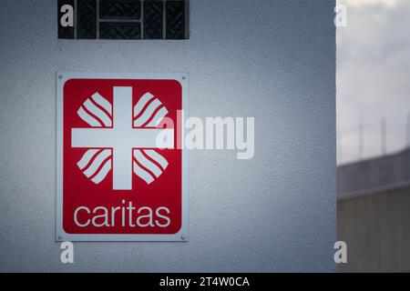Picture of a sign with the logo of Caritas Internationalis on their ...