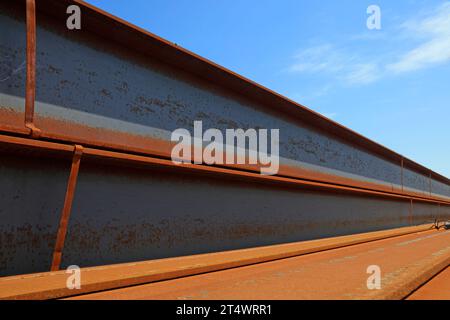 steel plate banding piled up together, closeup of photo Stock Photo - Alamy