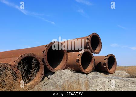 Dredging steel pipe piles in the open air Stock Photo - Alamy