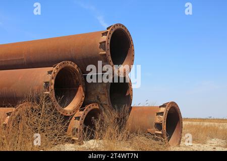 Dredging steel pipe piles in the open air Stock Photo - Alamy