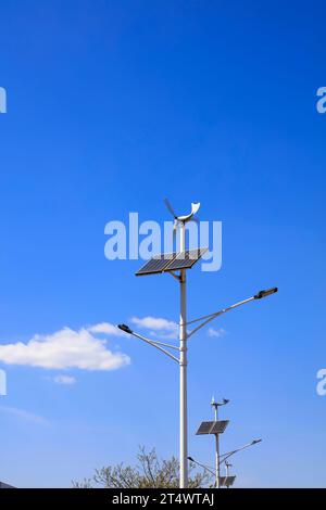 Solar wind street light under blue sky Stock Photo - Alamy