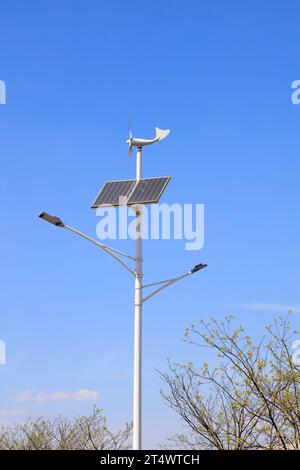 Solar wind street light under blue sky Stock Photo - Alamy