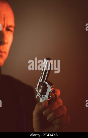 Gunman killer holding pistol artistic photo book cover design with ...
