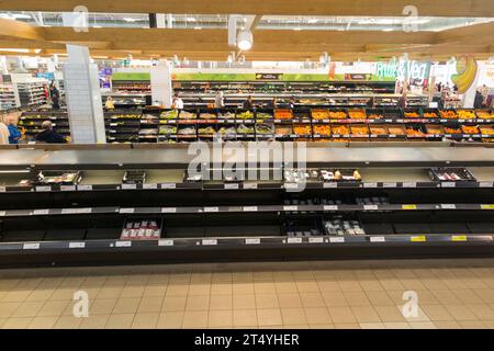 Slightly elevated view of shop floor of large Sainsbury's supermarket ...