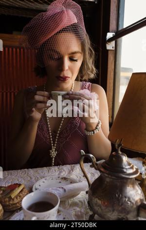 Reenactment scene of a vintage steam train conductor in a 1927 ...