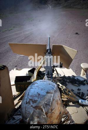 A Marine from the Combined Joint Task Force (CJTF) and an Australian ...