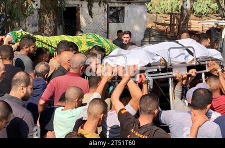Al Wazzani. 2nd Nov, 2023. People carry the body of a Lebanese citizen ...