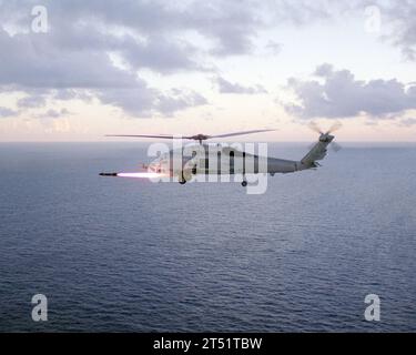 An AGM-114 Hellfire training missile sits in its container at a ...
