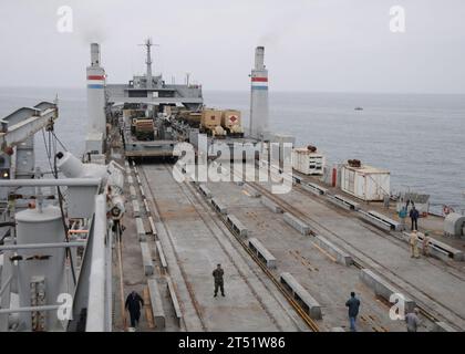An Improved Navy Lighterage System (INLS) causeway ferry approaches the ...